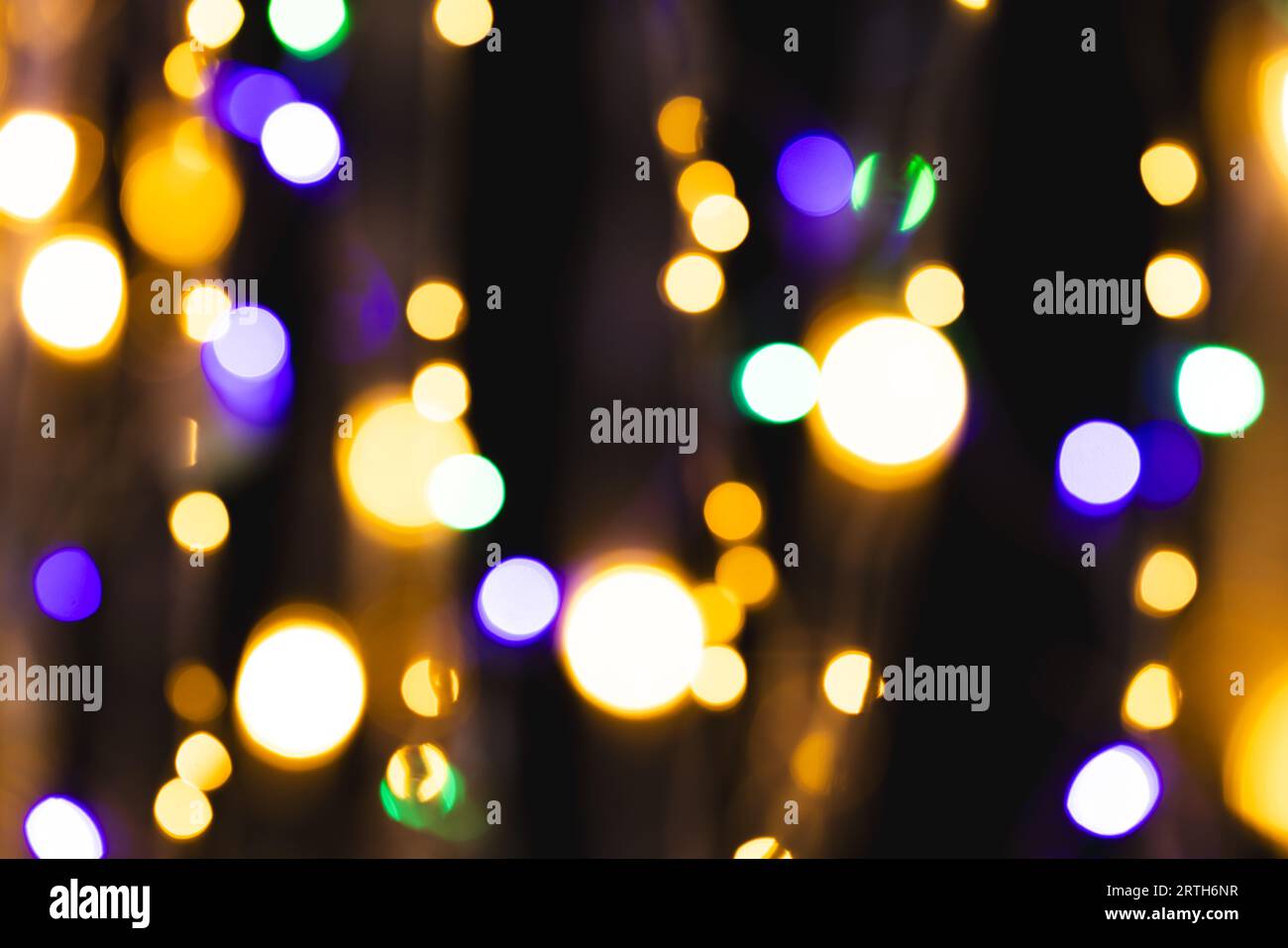 Multi coloured bokeh lights with copy space on dark background Stock ...