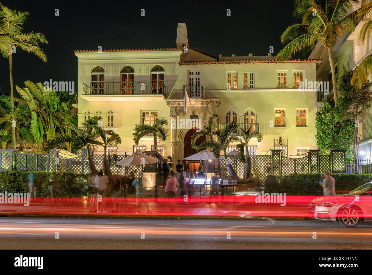 The Versace Mansion at night in Ocean Drive in Miami Beach, FL Stock ...