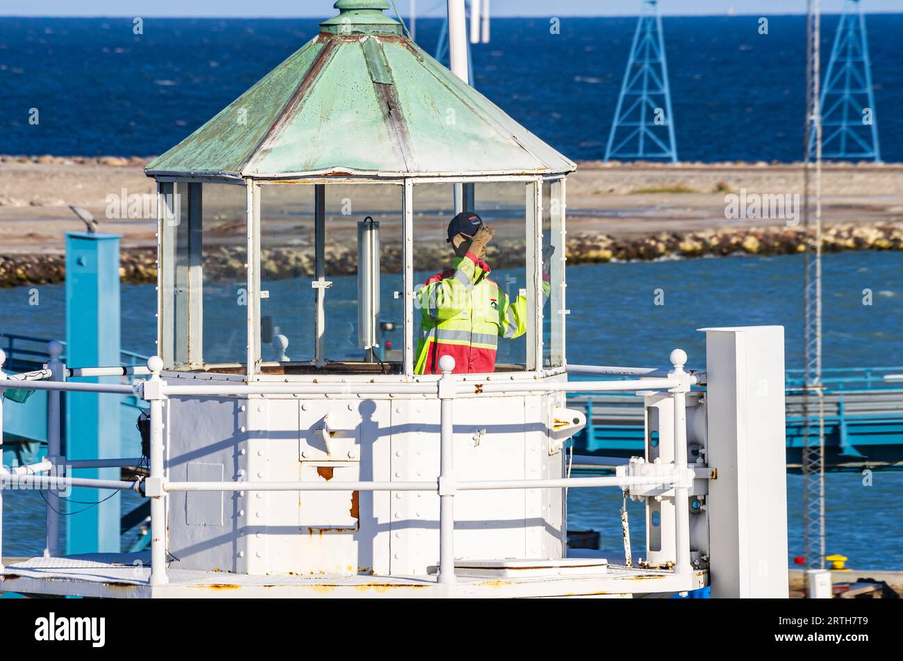 Swedish humour, a mannequin in a dockworker's work clothes keeps a ...