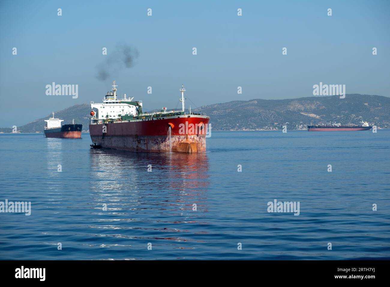 Container cargo ship loaded in Mediterranean sea at Piraeus harbor ...