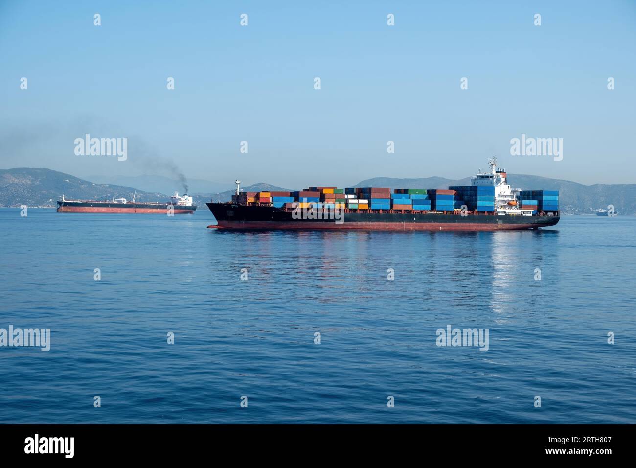 Container cargo ship loaded moored in Mediterranean sea, Greece ...