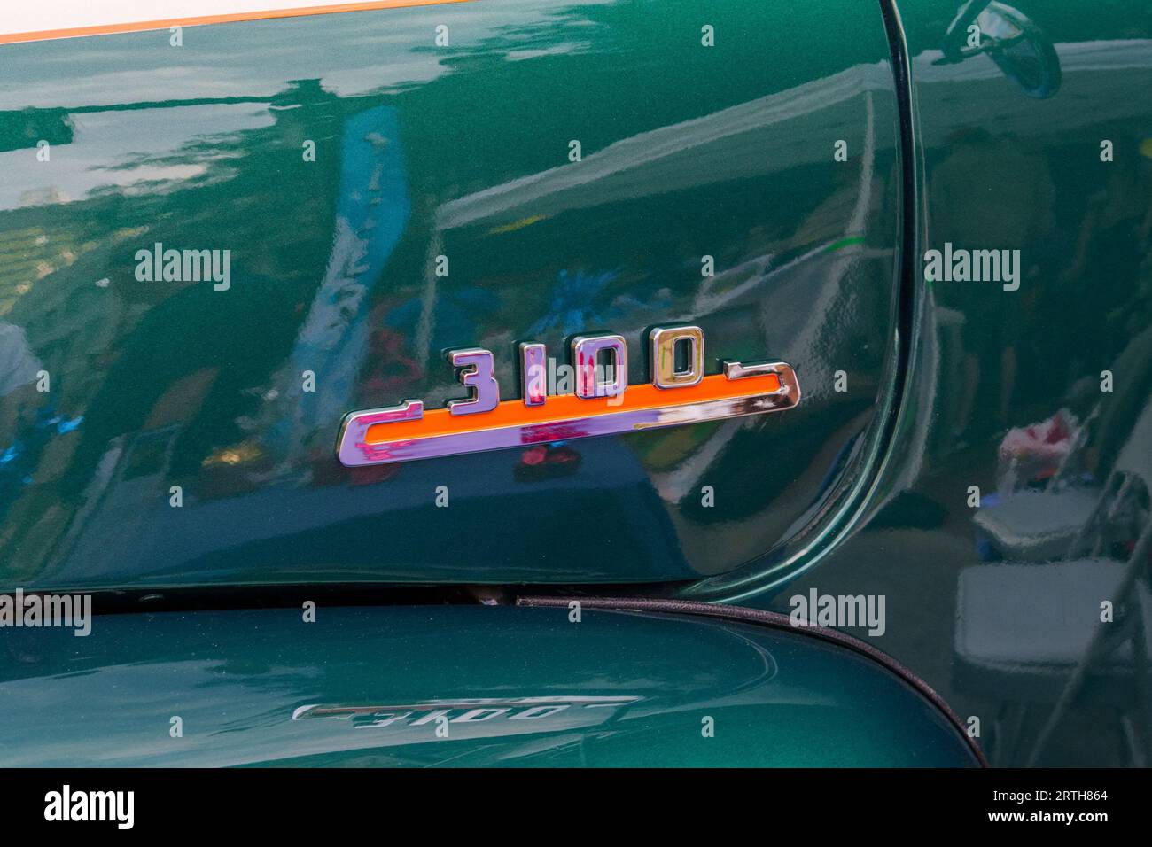 Closeup of an old-fashioned green antique car sign, featuring rustic ...