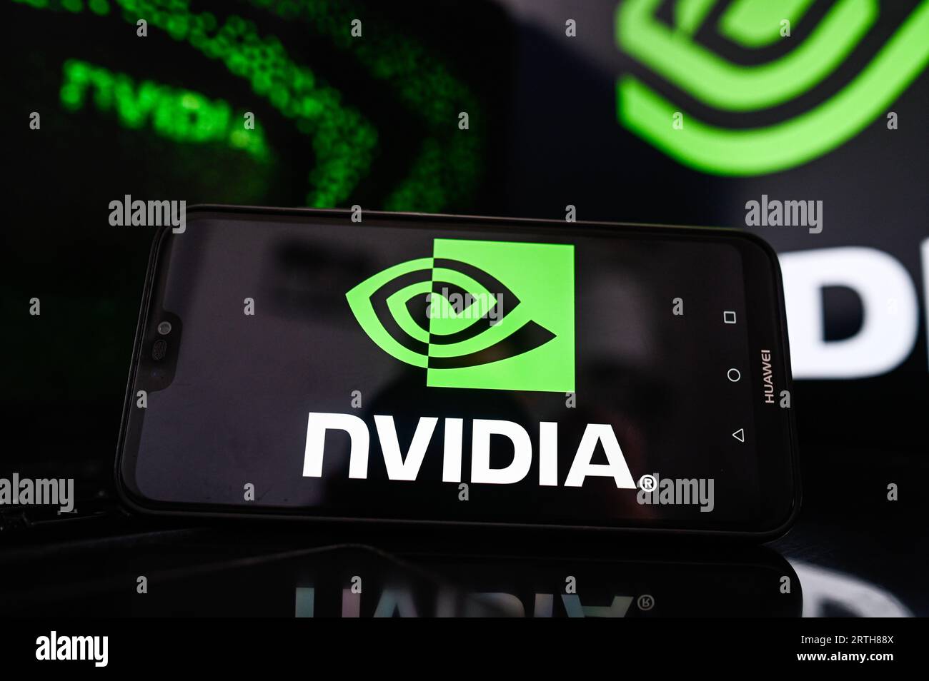 In this photo illustration a Nvidia logo is displayed on a smartphone ...