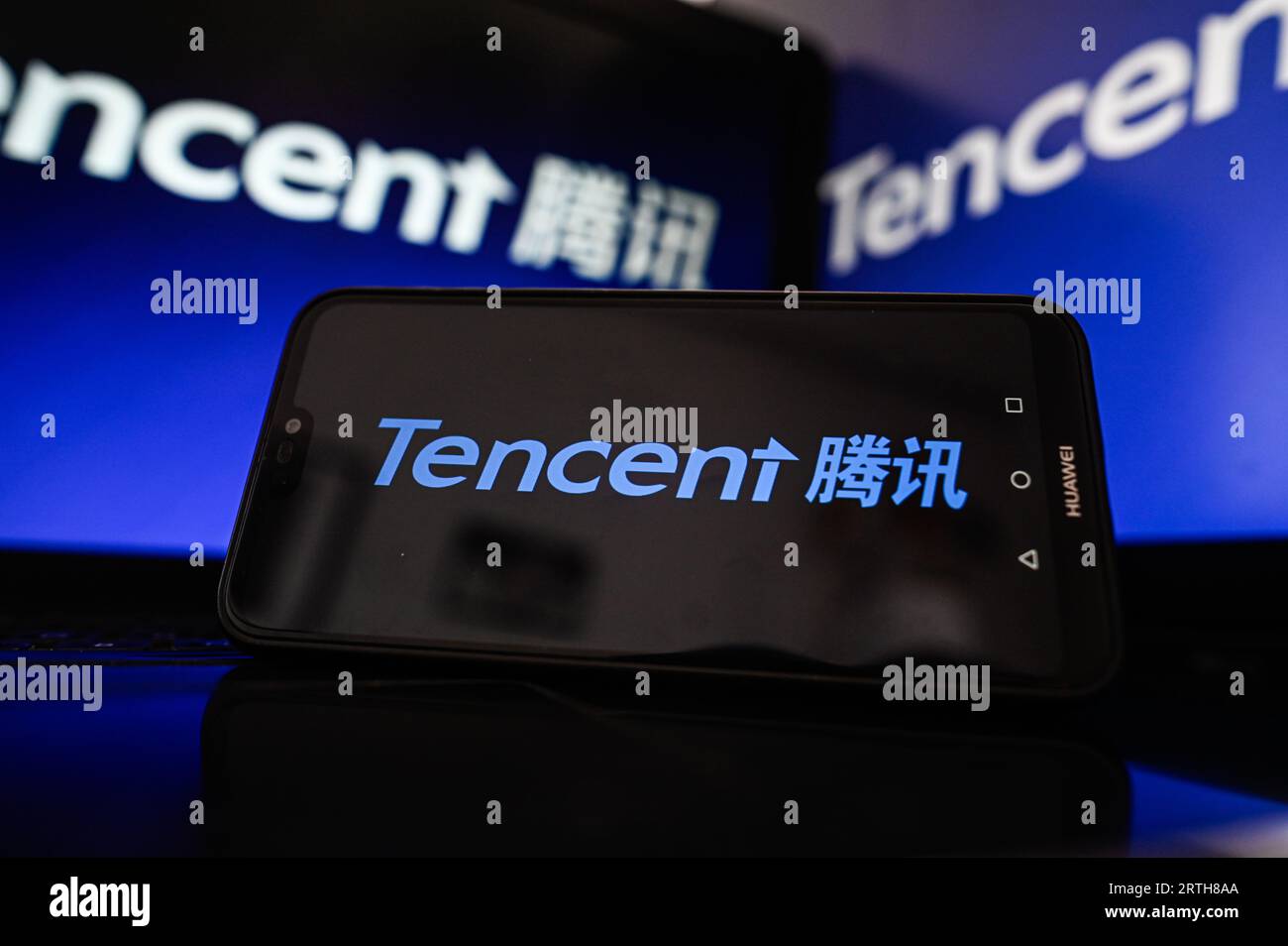 In this photo illustration a Tencent logo is displayed on a smartphone ...