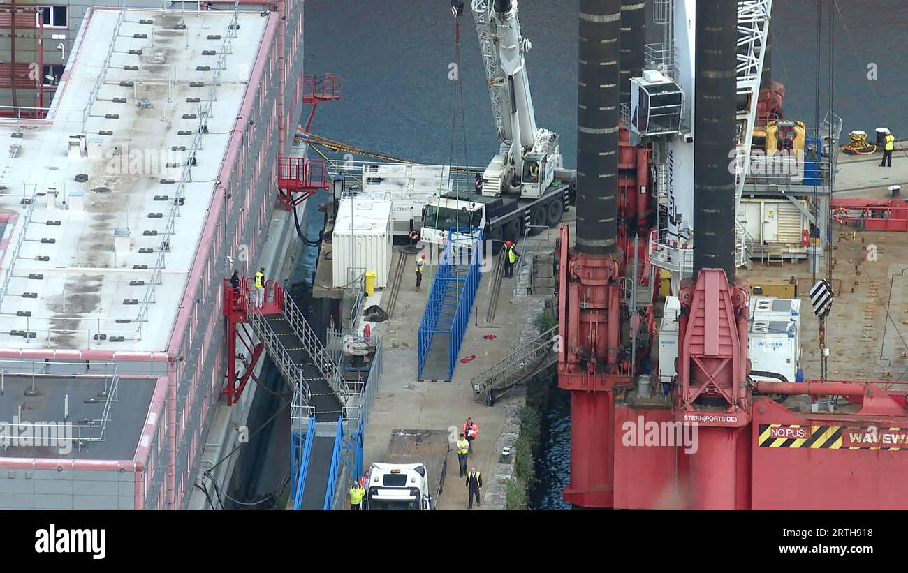 Screen grab taken from PA Video of a new gangway ramp being moved into ...