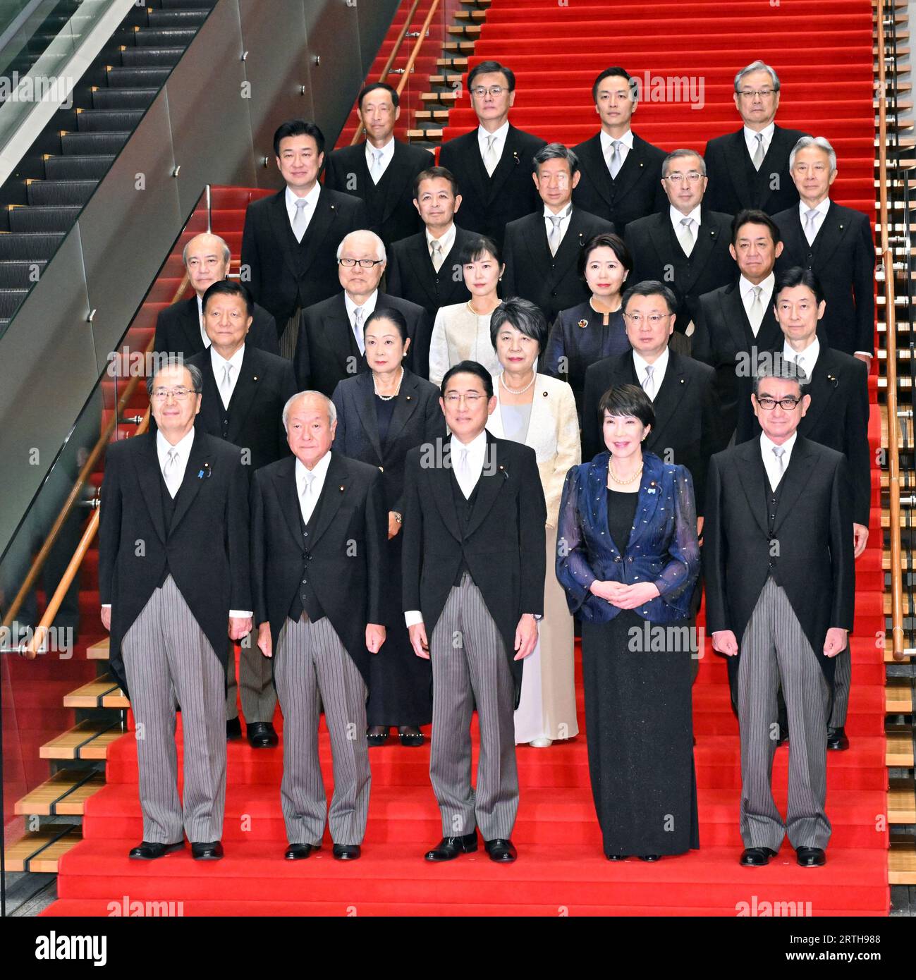 Japanese Prime Minister Fumio Kishida (front,C) and his Cabinet ministers pose for a photo ...