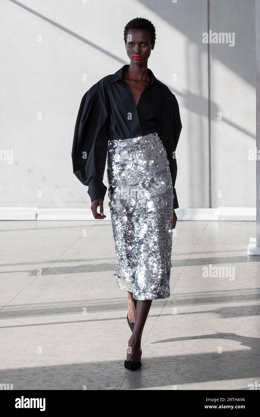 New York, USA. 12th Sep, 2023. Model Amar Akway walks on the runway at ...