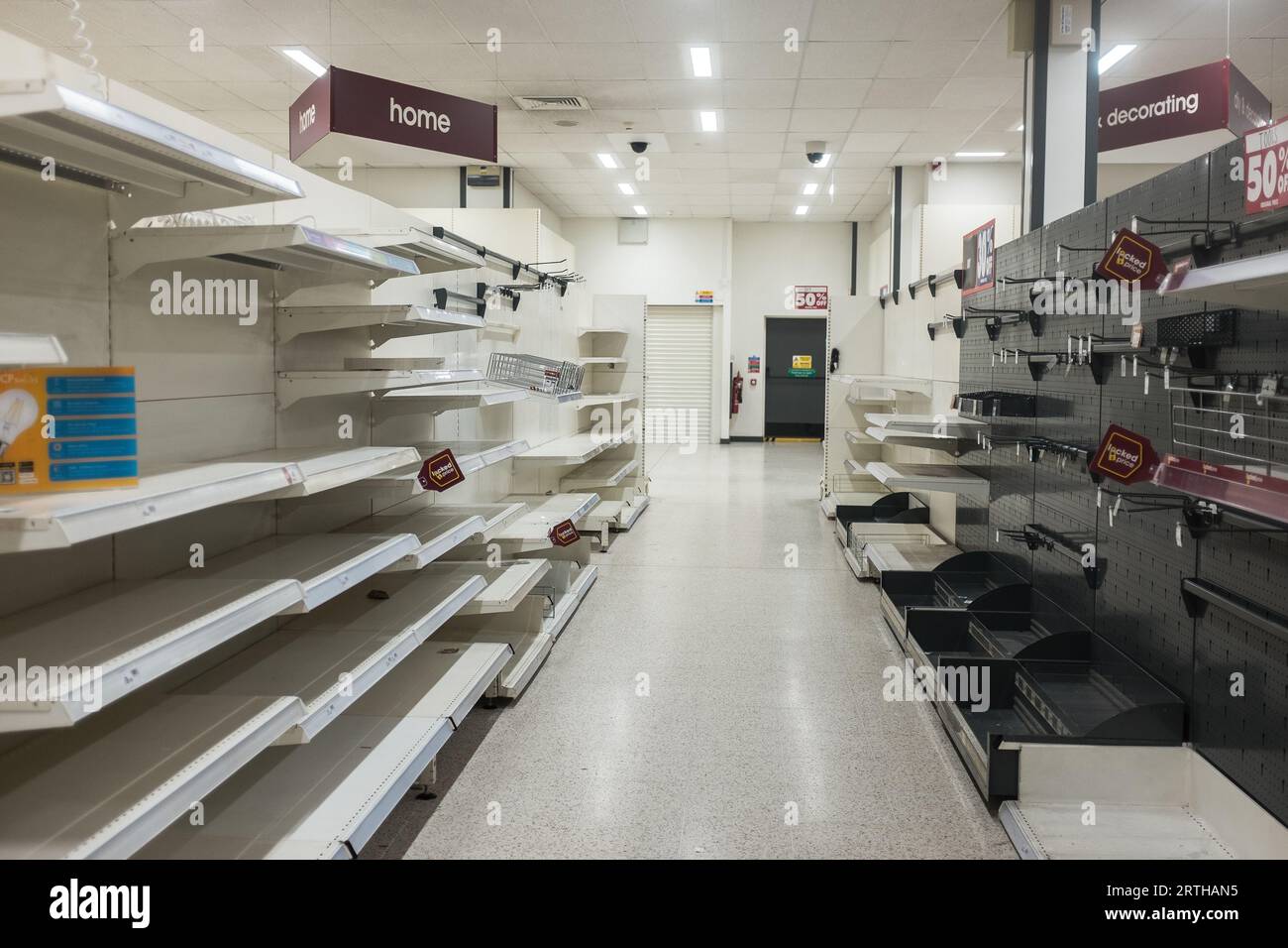 Empty supermarket shelves Stock Photo - Alamy