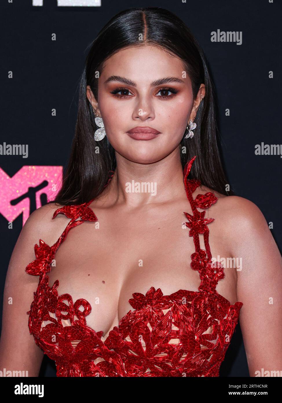 NEWARK, NEW JERSEY, USA - SEPTEMBER 12: American singer and actress Selena Gomez wearing a ...