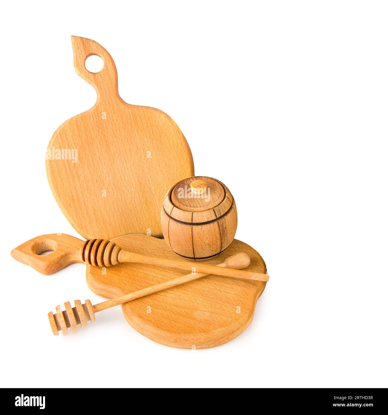 Cutting boards, dipper and wooden jar isolated on white background ...