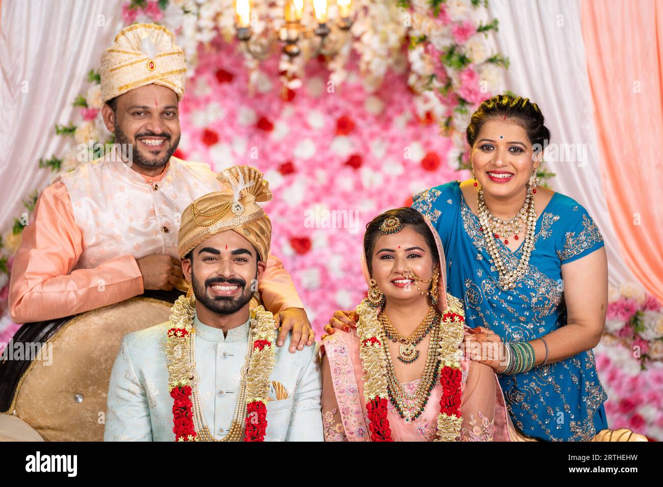 Portrait of Happy smiling Indian middle aged Father and Mother with ...