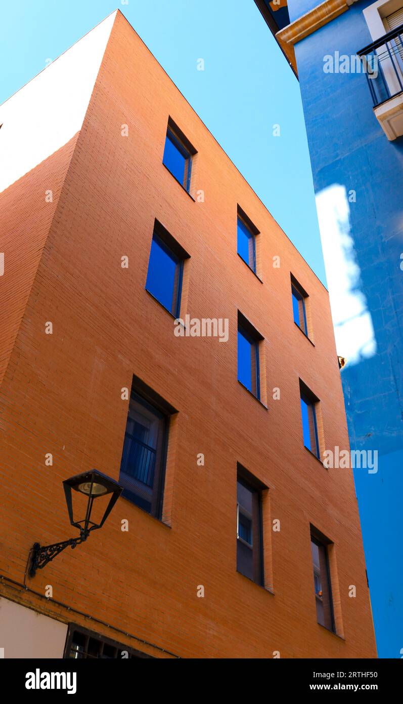Rectilinear and geometric facade with blue windows and modern ...