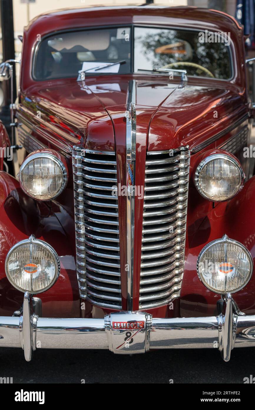 An old-fashioned red Pontiac Six car parked outside in Manchester, the ...