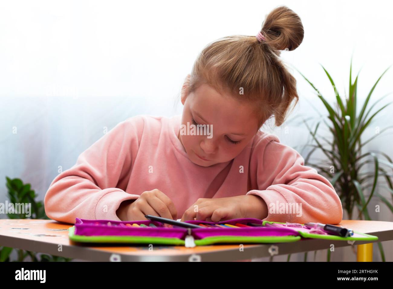 Child girl doing homework. Quarantine Stock Photo - Alamy