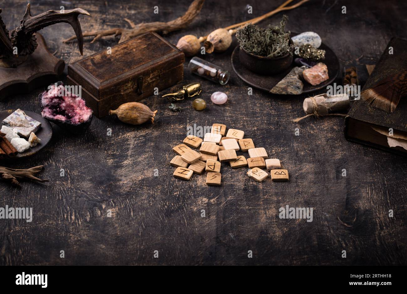 Esoteric magical background with runes Stock Photo - Alamy