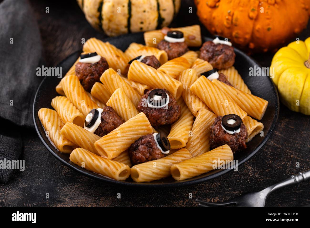 Halloween pasta with meatballs monster eye Stock Photo - Alamy