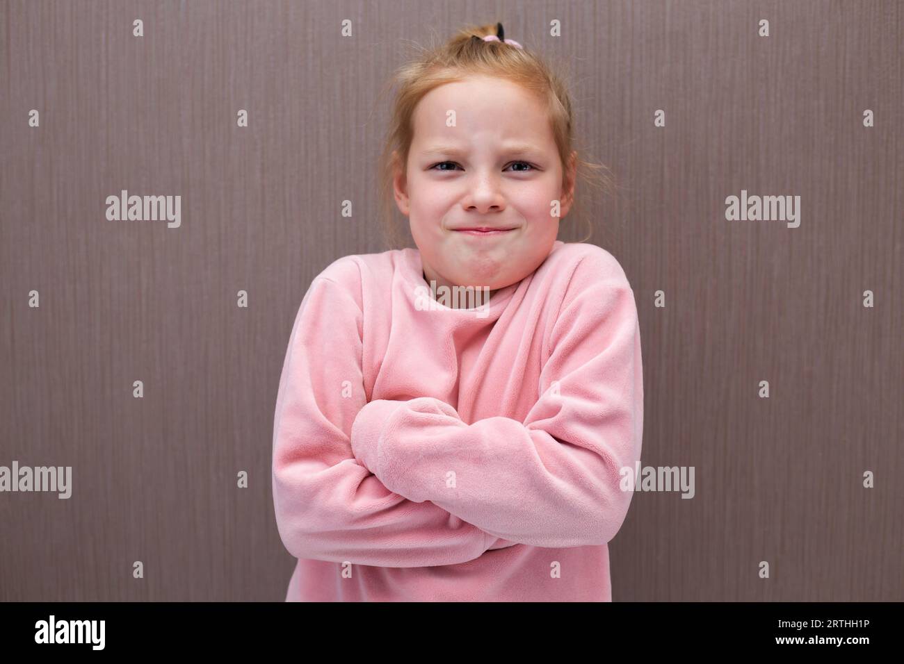 Little angry child girl in pink blouse Stock Photo - Alamy