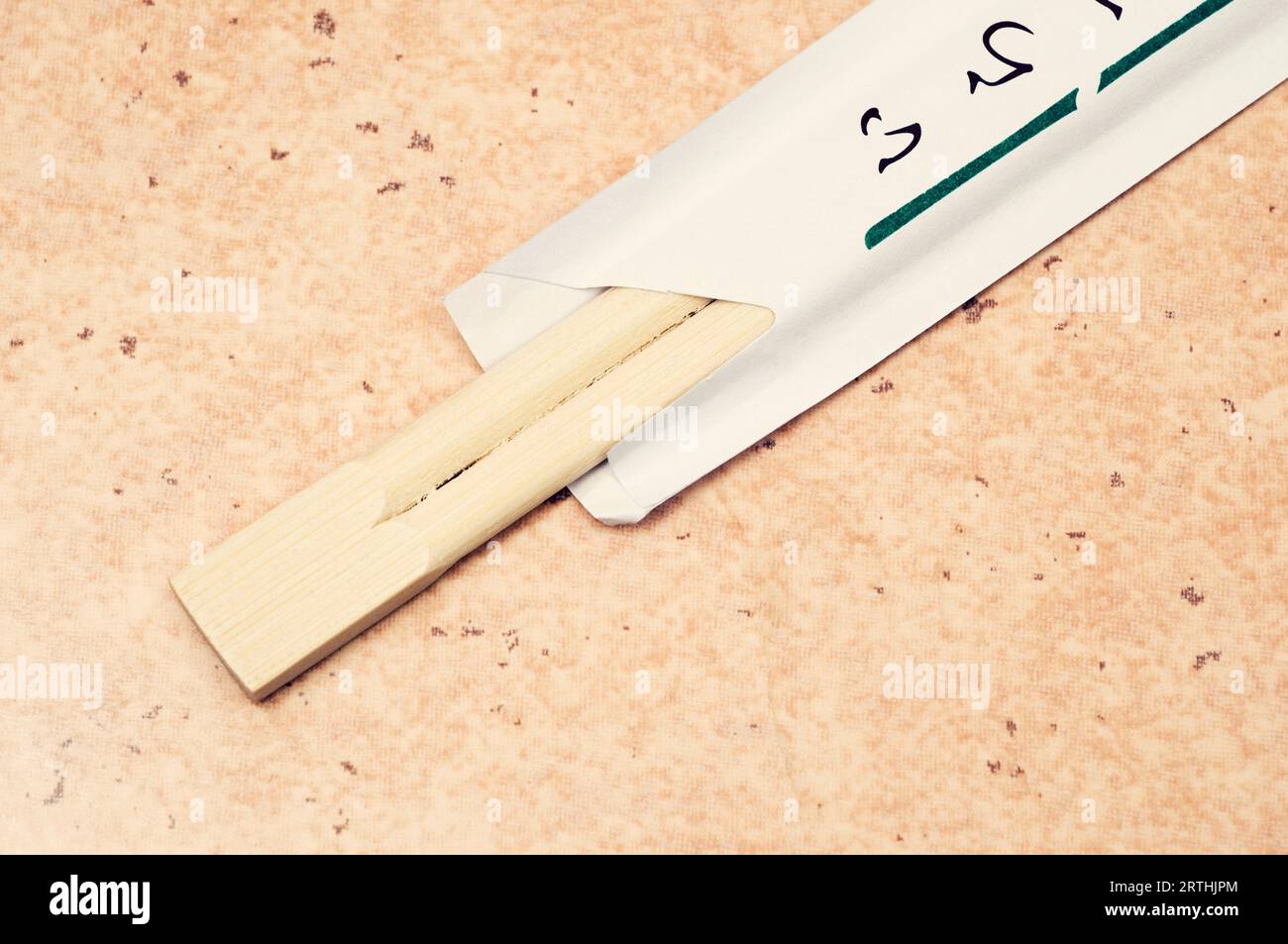 Chopsticks in paper wrapper Stock Photo - Alamy