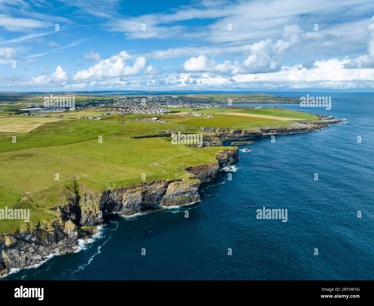 Aerial view of rugged cliffs on the North Sea coast, with the harbour ...