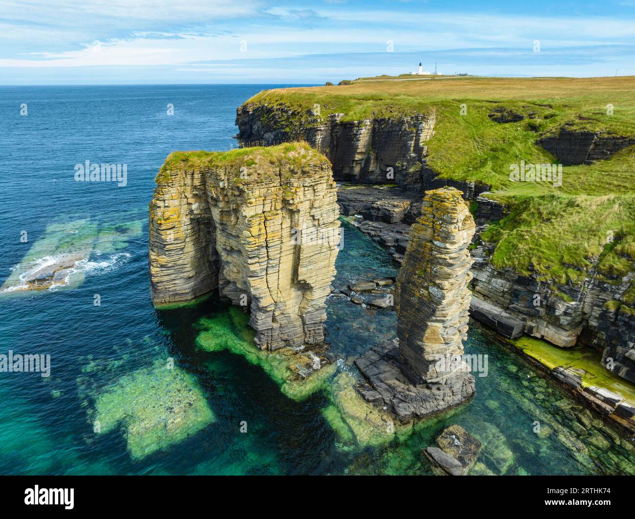 Aerial view of rock towers, surf pillars on the North Sea coast near Wick, County Caithness ...