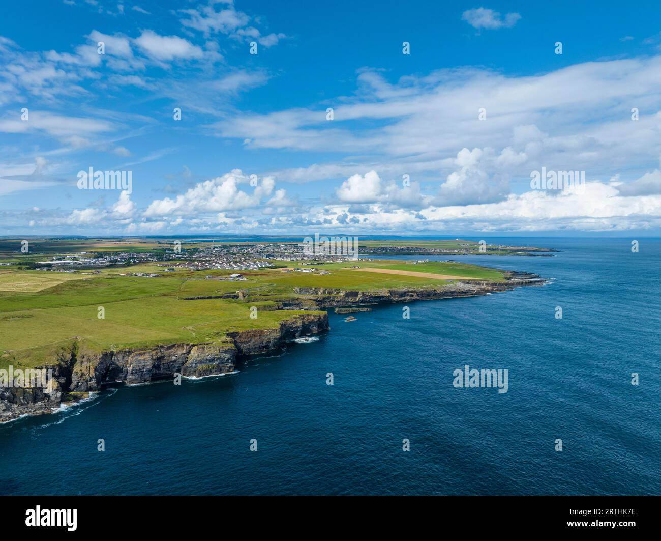 Aerial view of rugged cliffs on the North Sea coast, with the harbour ...