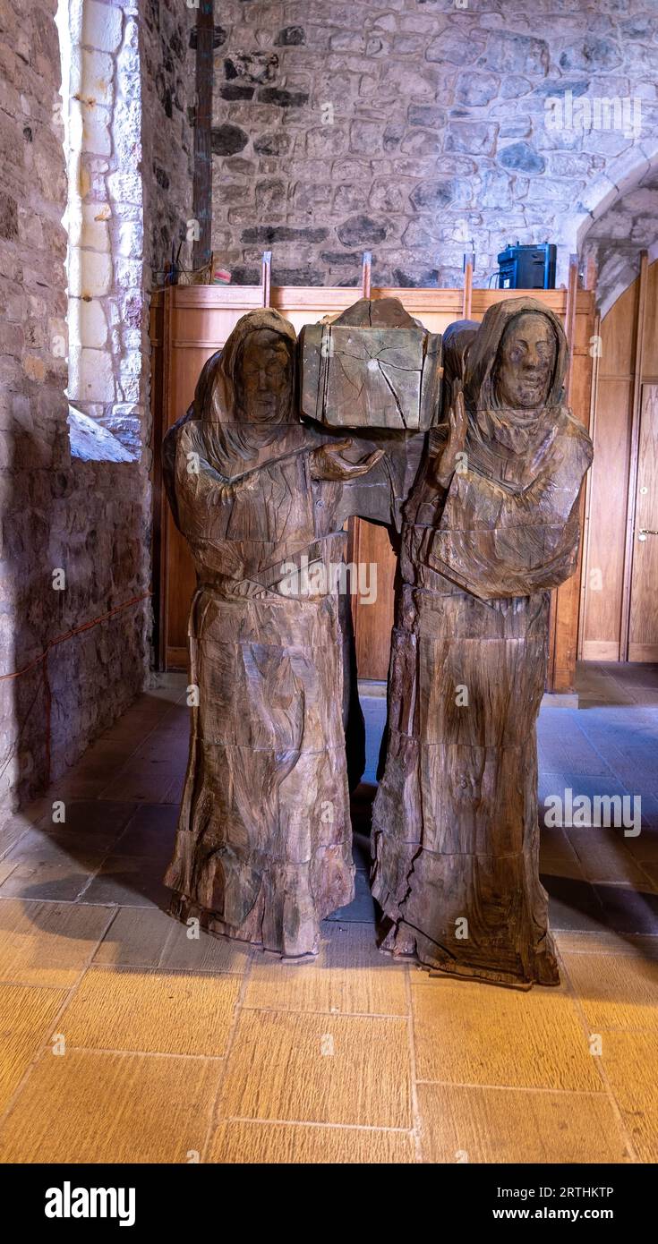 Statue carving of people carrying a coffin in St Mary's Church, Holy ...