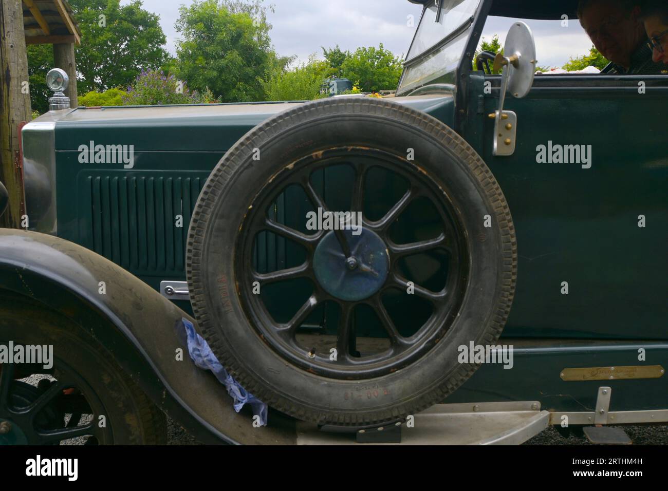 dark green vintage morris convertible with spare wheel Stock Photo - Alamy