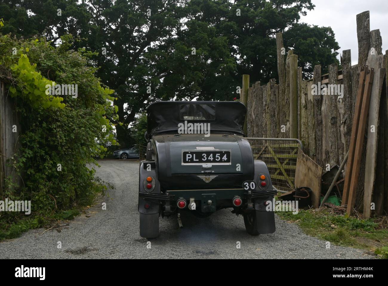 dark green vintage morris convertible with spare wheel Stock Photo - Alamy