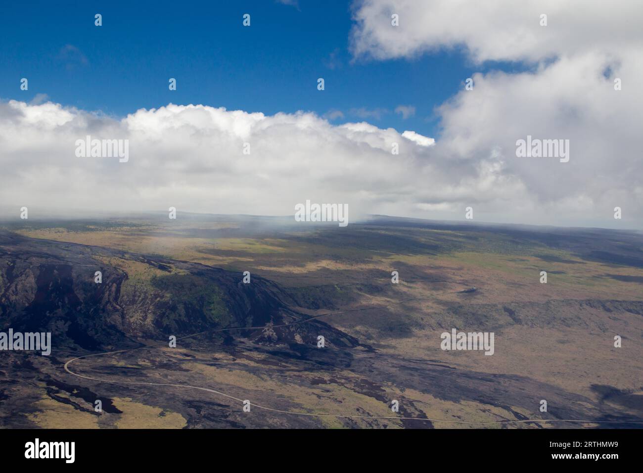Volcanic fumes rise from the crater of the active volcano Kilauea on ...