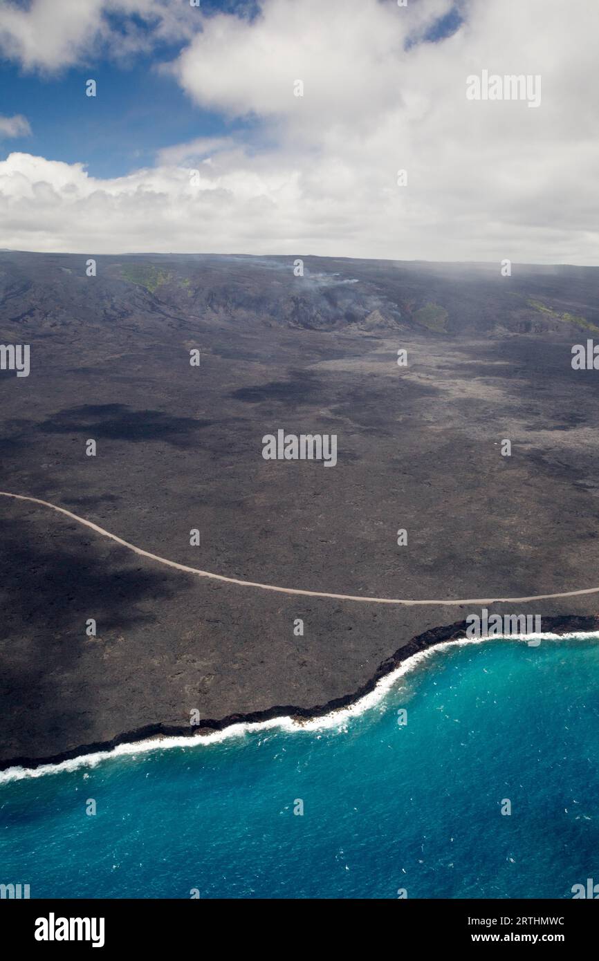Volcanic fumes rise from the mountain flank of Kilauea on the south ...