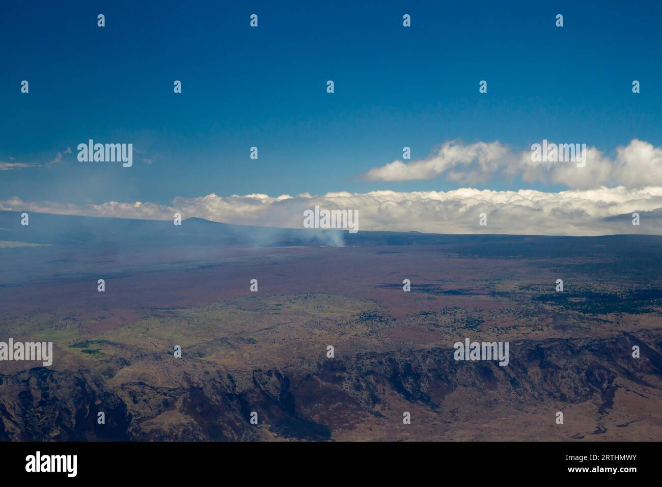 Volcanic fumes rise from the crater of the active volcano Kilauea on ...
