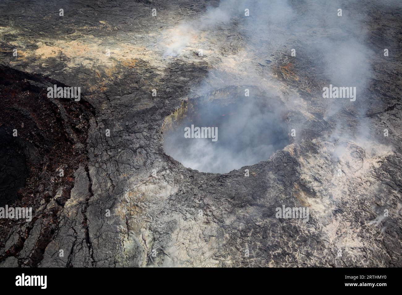 Aerial view of the smoking Halemaumau crater on Kilauea, an active ...