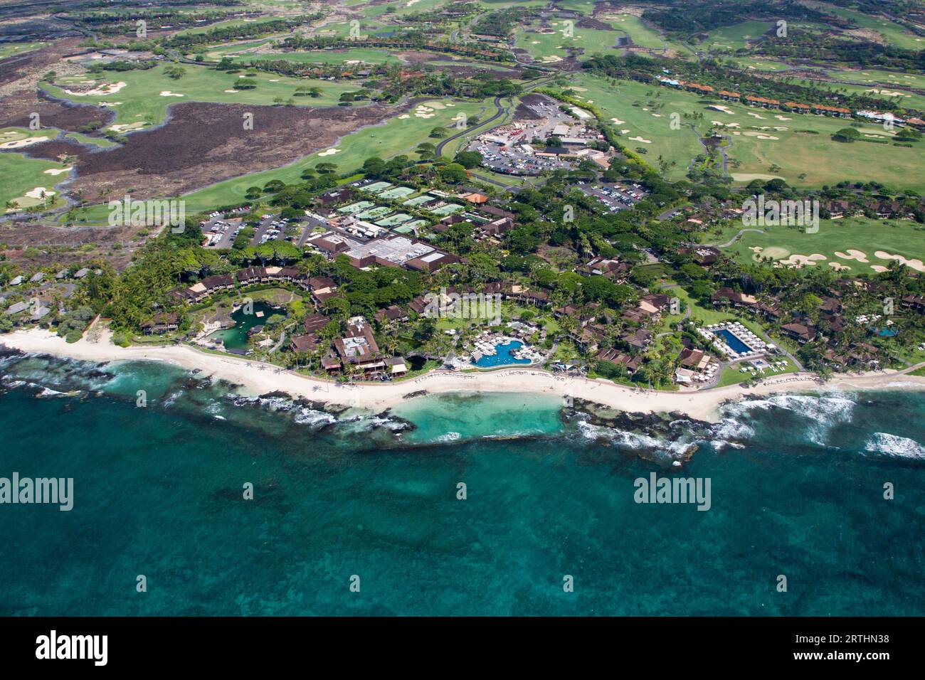 Aerial view of the Hualalai Resort on Kahuwai Bay on the west coast of ...