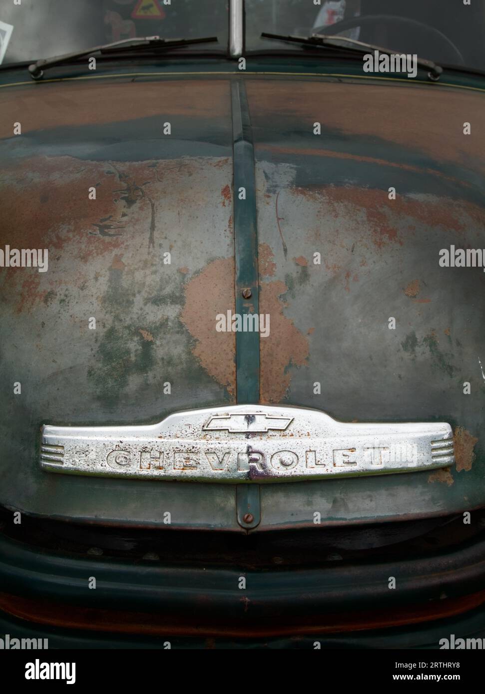 Chevrolet Badge On The Bonnet With Rust And Worn Paint Of A 1950s ...