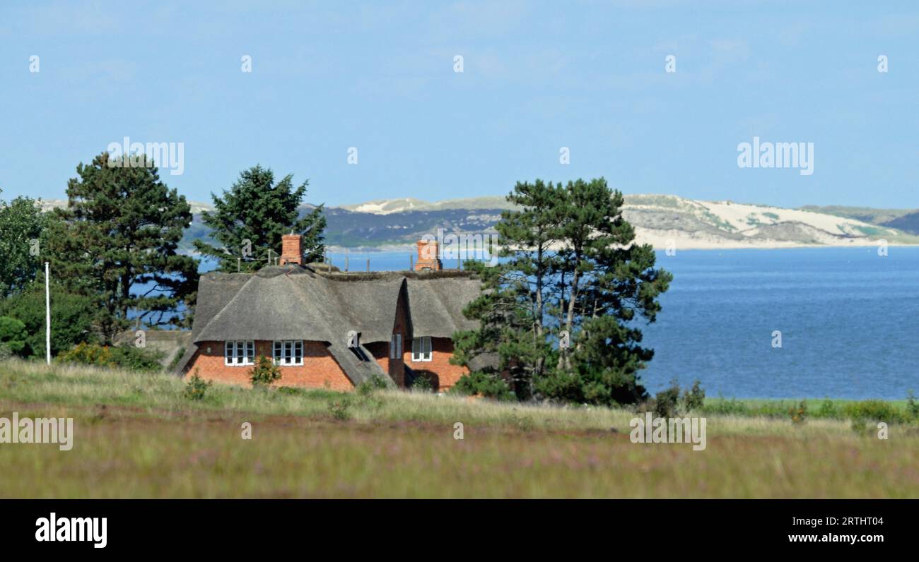 Thatched Roof House on the Wadden Sea Stock Photo - Alamy