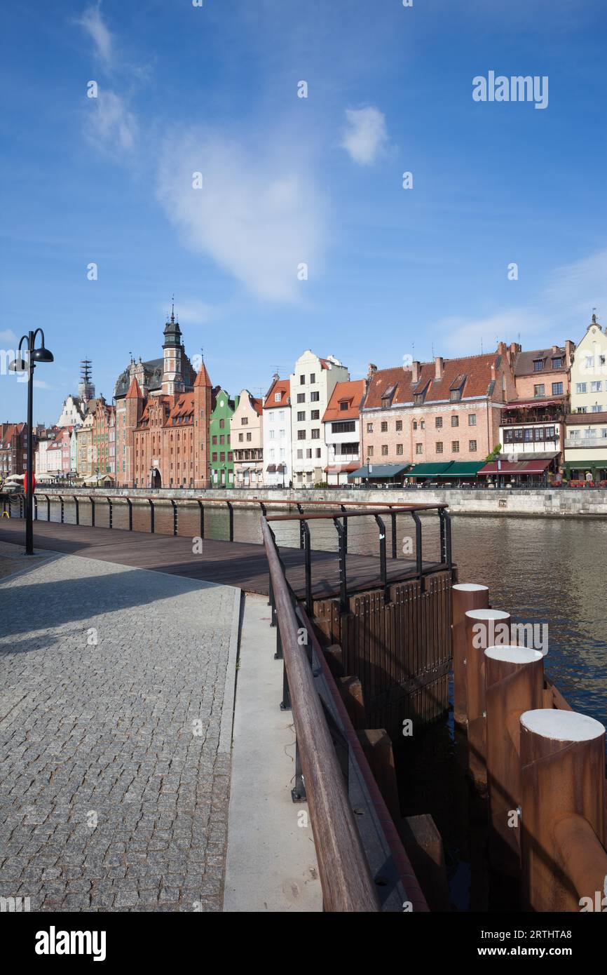 Promenade along Motlawa River and Old Town skyline in city of Gdansk ...
