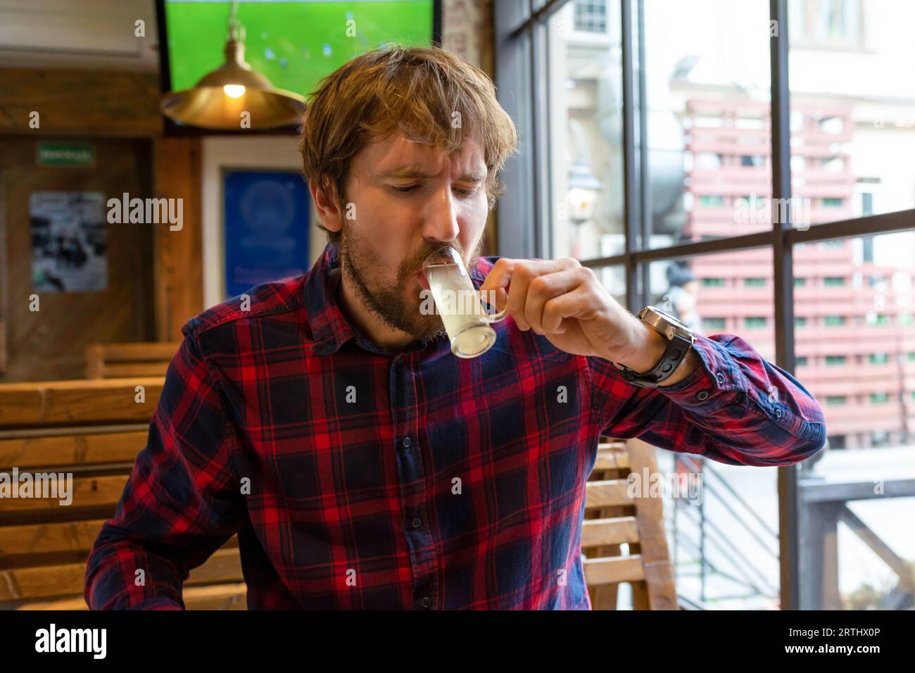 Unhappy man in pub portrait hi-res stock photography and images - Alamy