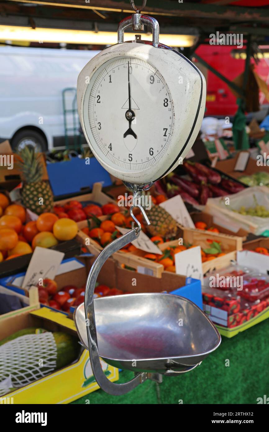 Mechanical Hanging Scale in Pounds at Farmers Market Stall Stock Photo ...