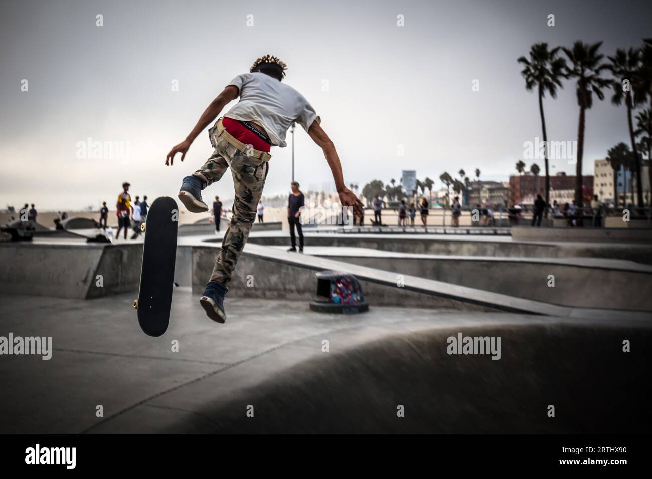 A skateboarder in action at Venice Beach Skate Park in Los Angeles ...