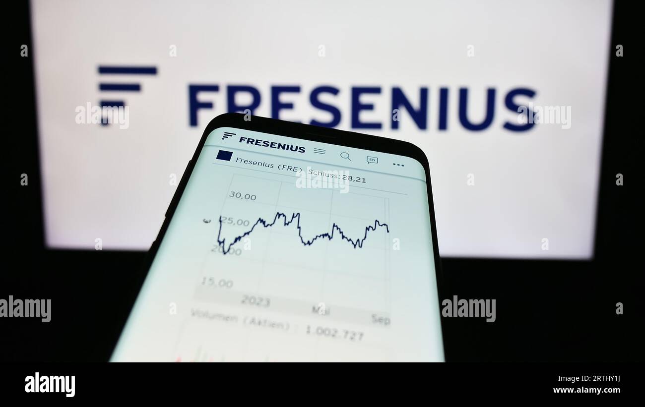 Mobile phone with webpage of German healthcare company Fresenius SE Co ...