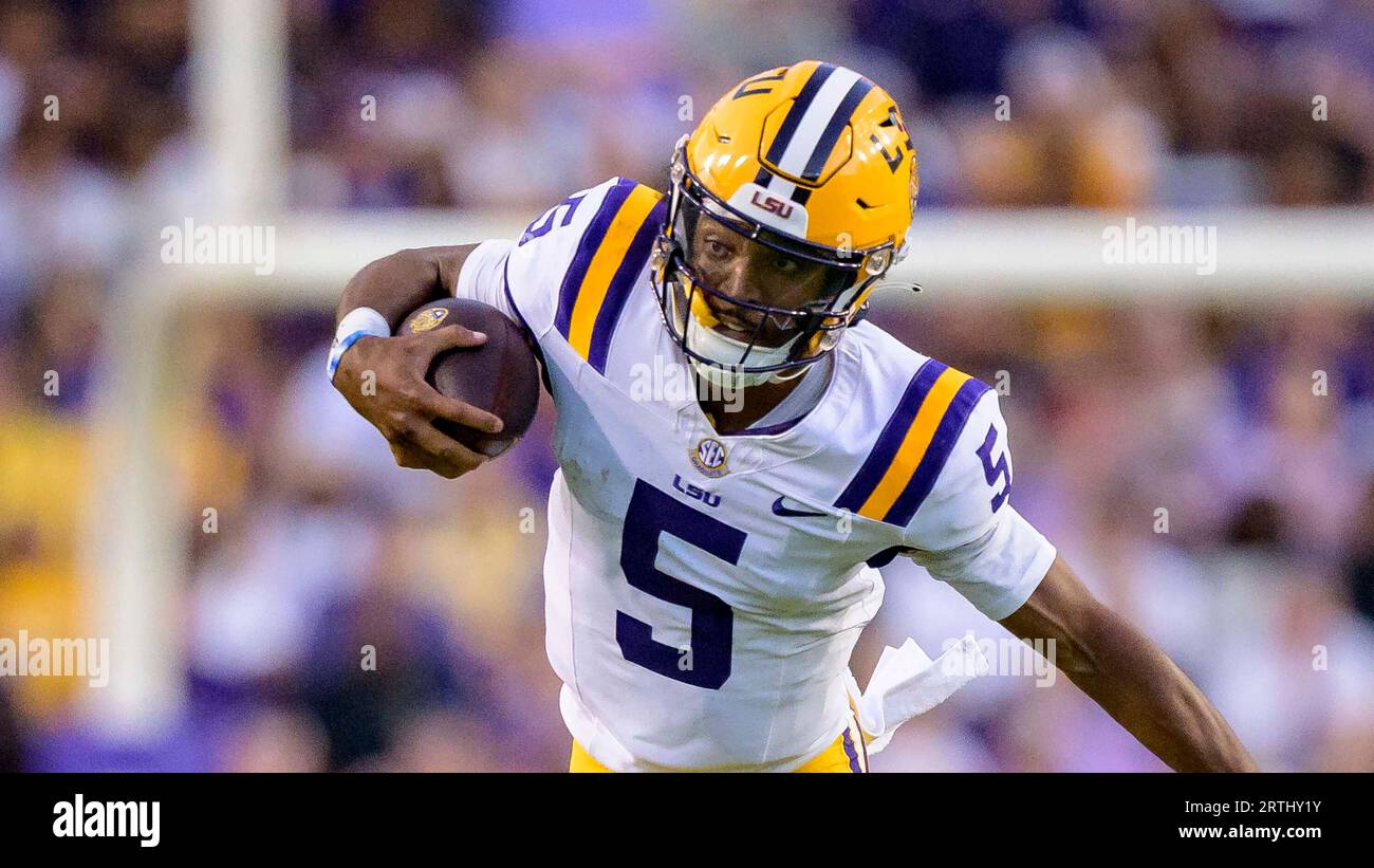 LSU quarterback Jayden Daniels (5) runs during an NCAA college football ...