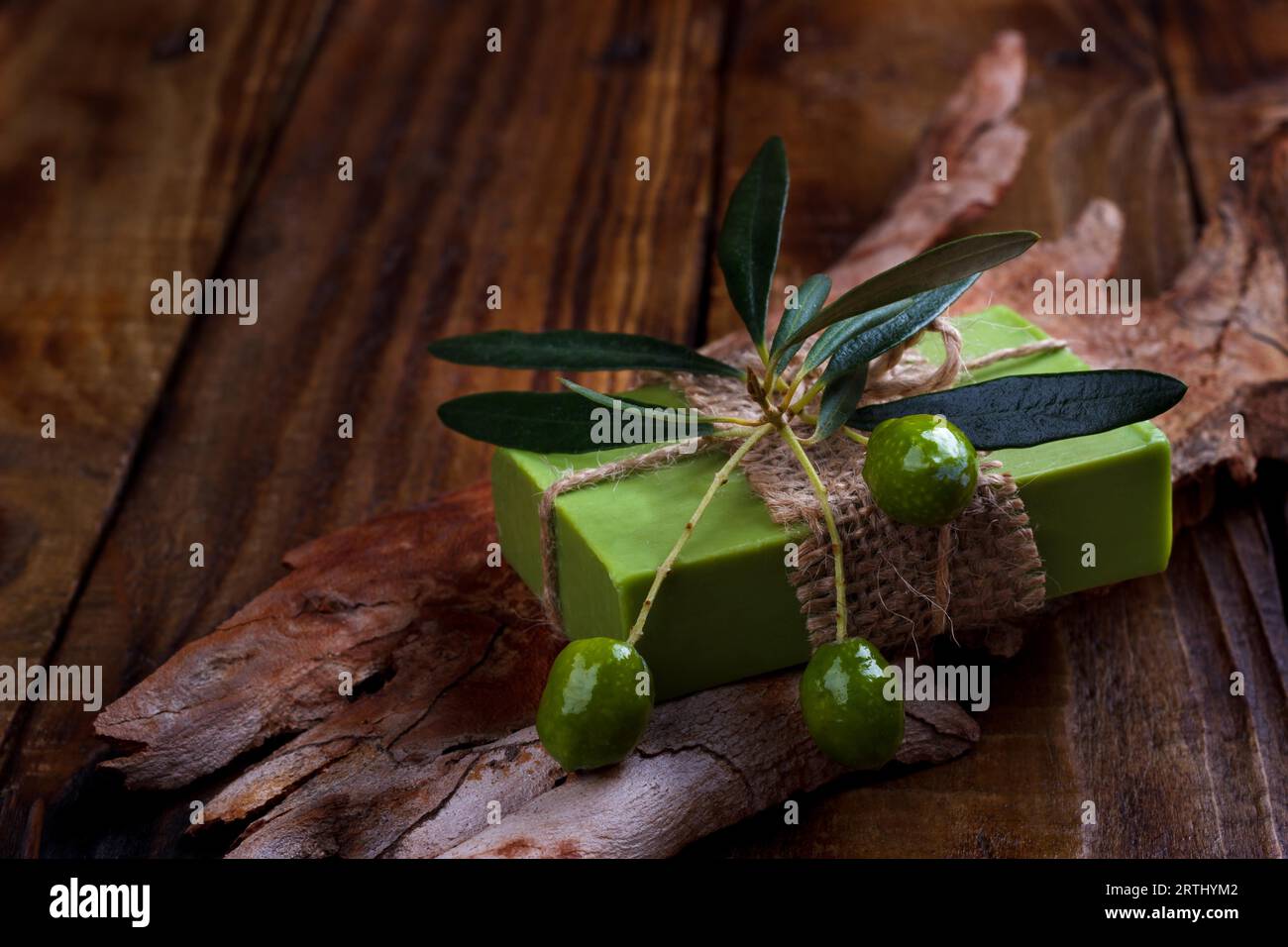 Handmade olive oil soap on rustic wooden background Stock Photo - Alamy