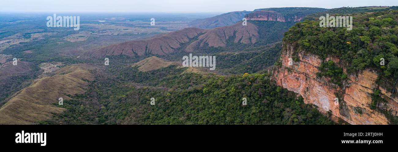 Aerial view of table mountain cliffs with foothills covered with ...