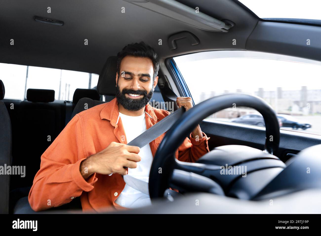 Indian driver man putting hi-res stock photography and images - Alamy