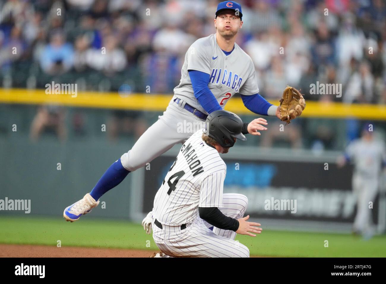 Chicago Cubs second baseman Nico Hoerner (2) throws over Colorado ...