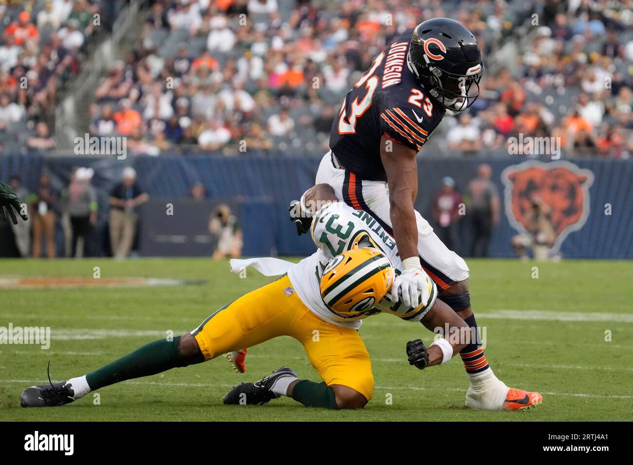 Chicago Bears running back Roschon Johnson (23) is tackled by Green Bay ...