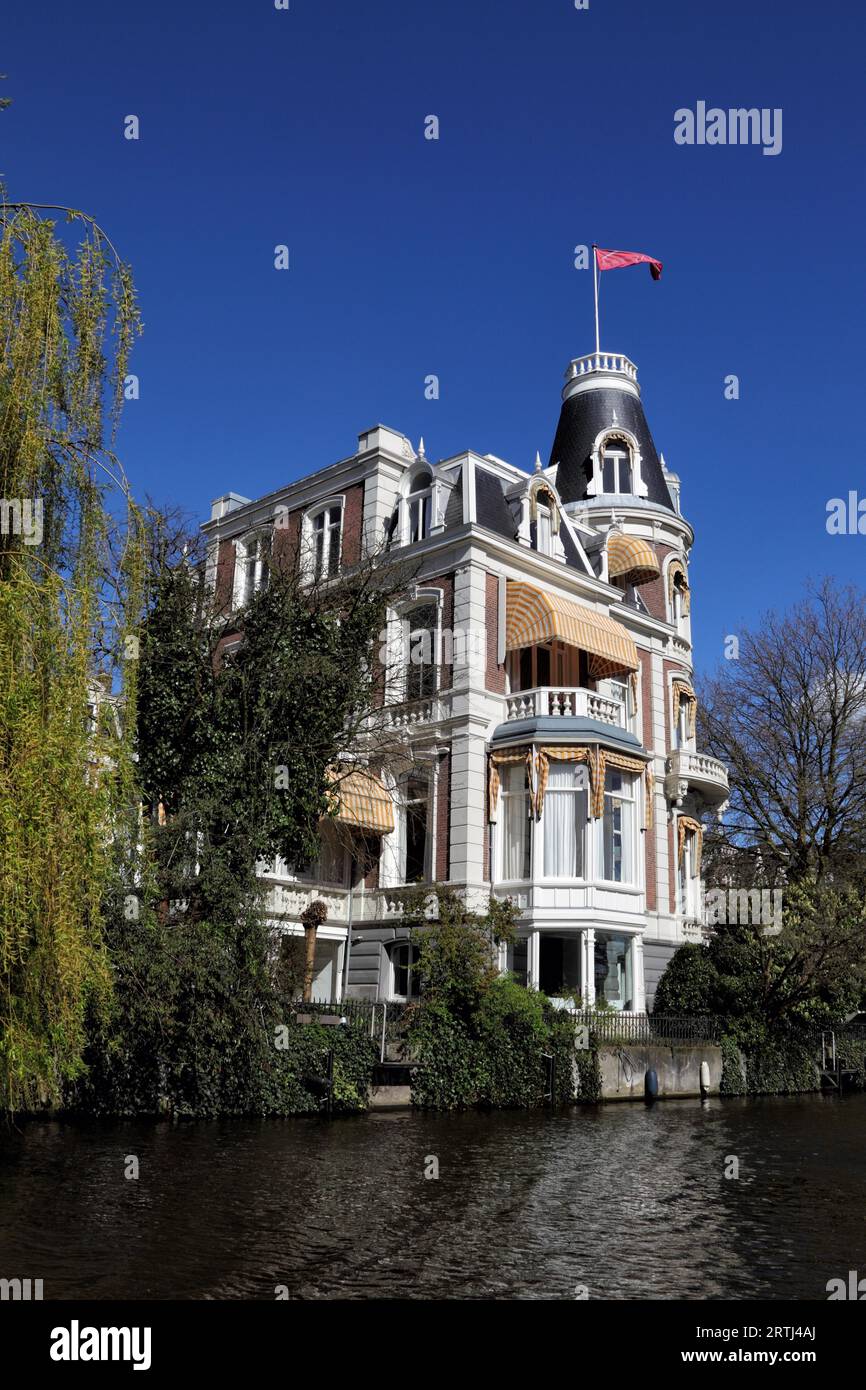 Villa on the banks of a canal in Amsterdam, Netherlands Stock Photo - Alamy