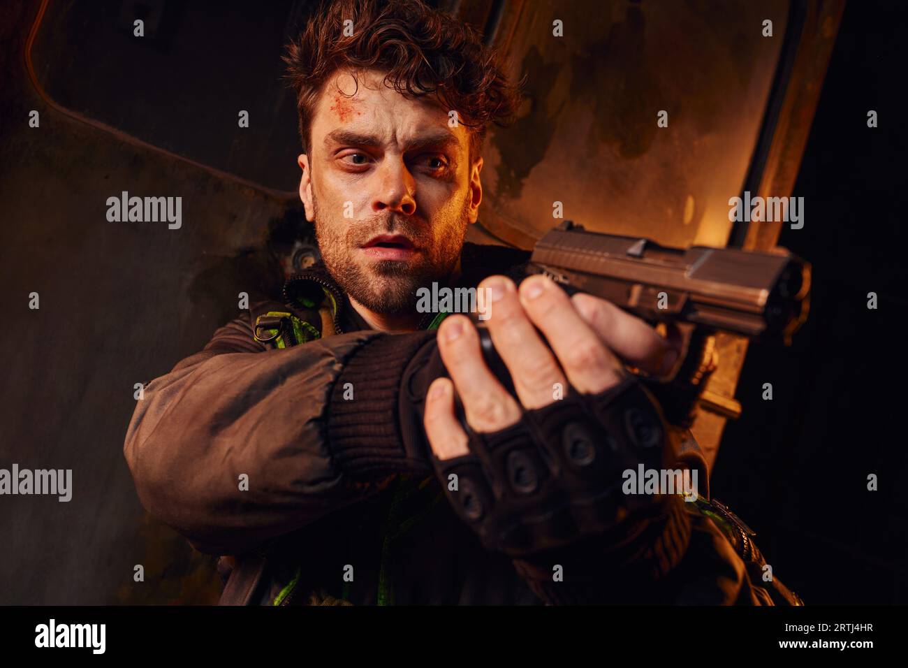 concentrated man with unshaven scratched face looking away and aiming ...