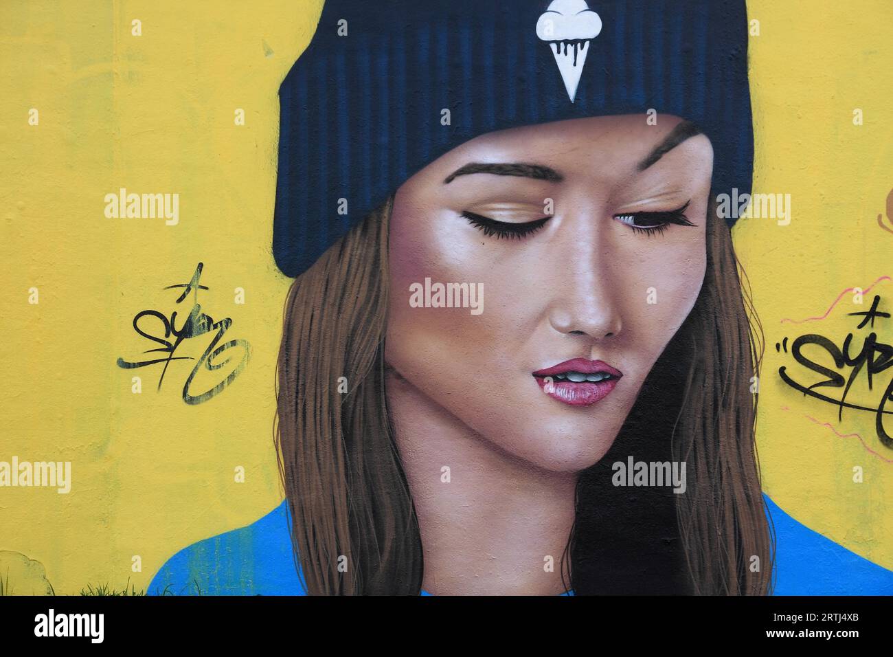 Photorealistic graffiti, Female youth with long hair and cap Stock ...