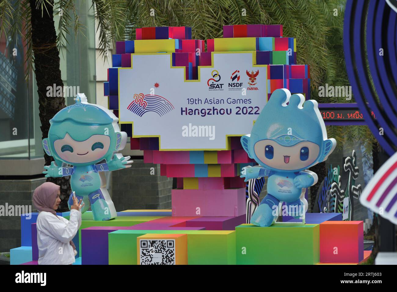 Bangkok, Thailand. 13th Sep, 2023. A pedestrian takes photos in front ...